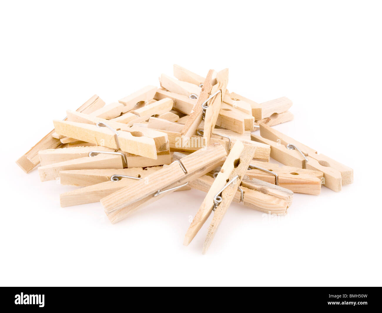 Picture of wooden pegs on white background Stock Photo - Alamy