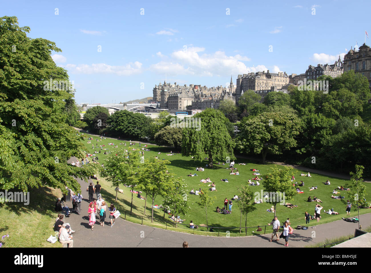 people enjoying a summer's day in Princes gardens Edinburgh Scotland ...