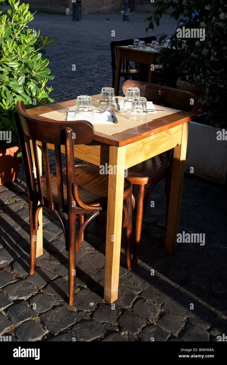 trattoria restaurant pizzeria table set on street in Rome Italy Stock ...