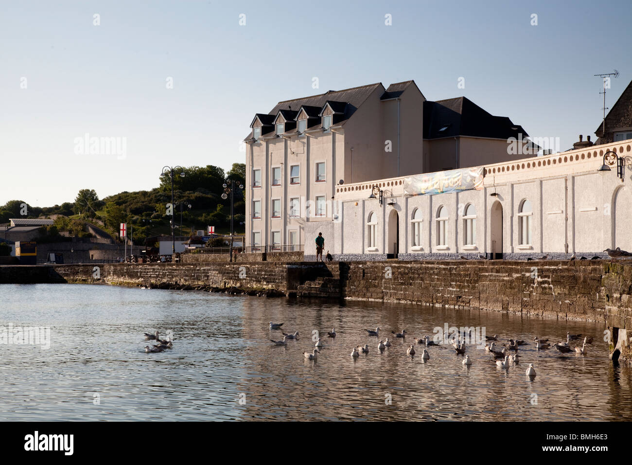 promenade, sea wall, slipway and stone groynes at Swanage in the early ...
