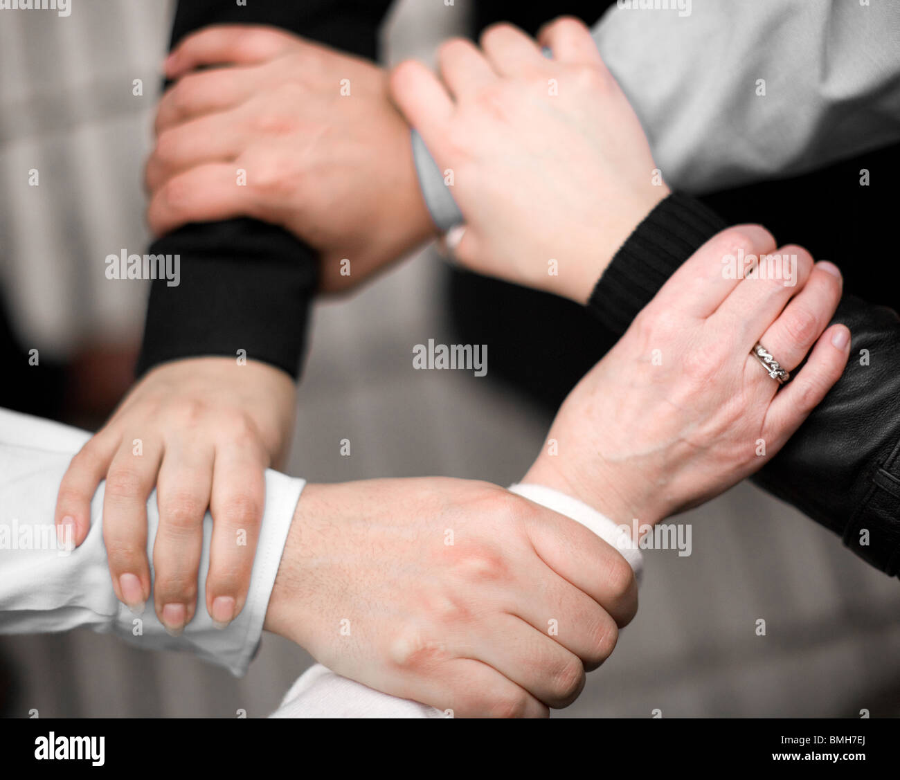 hands representing team work Stock Photo - Alamy