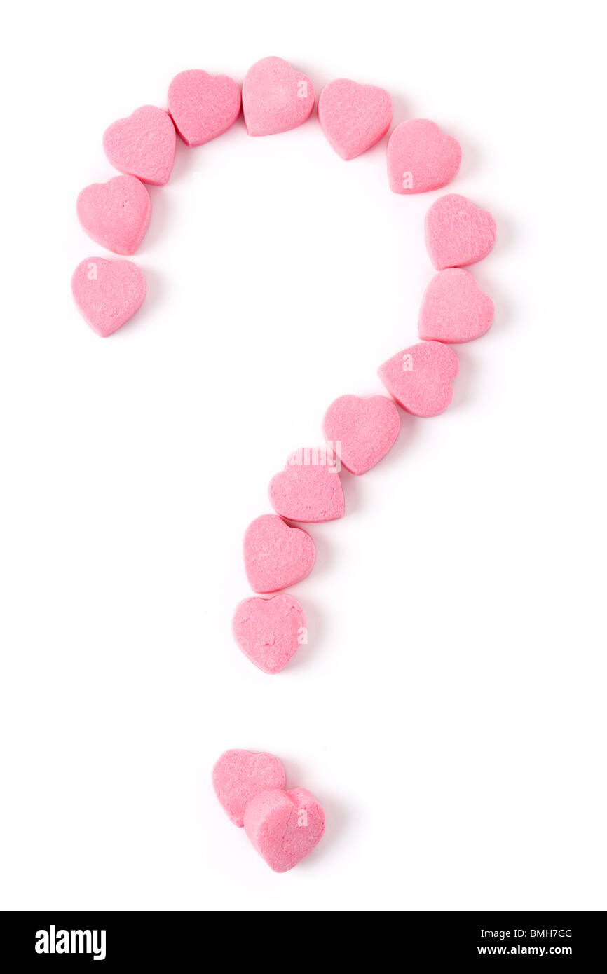 Pink Heart Shape Candy and Question Mark, Love Puzzle Stock Photo - Alamy