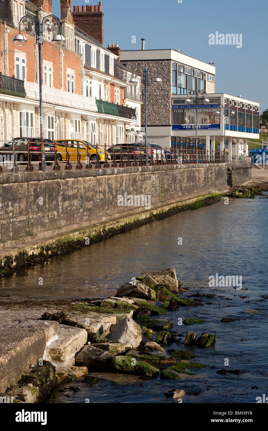 promenade, sea wall, slipway and stone groynes at Swanage in the early ...