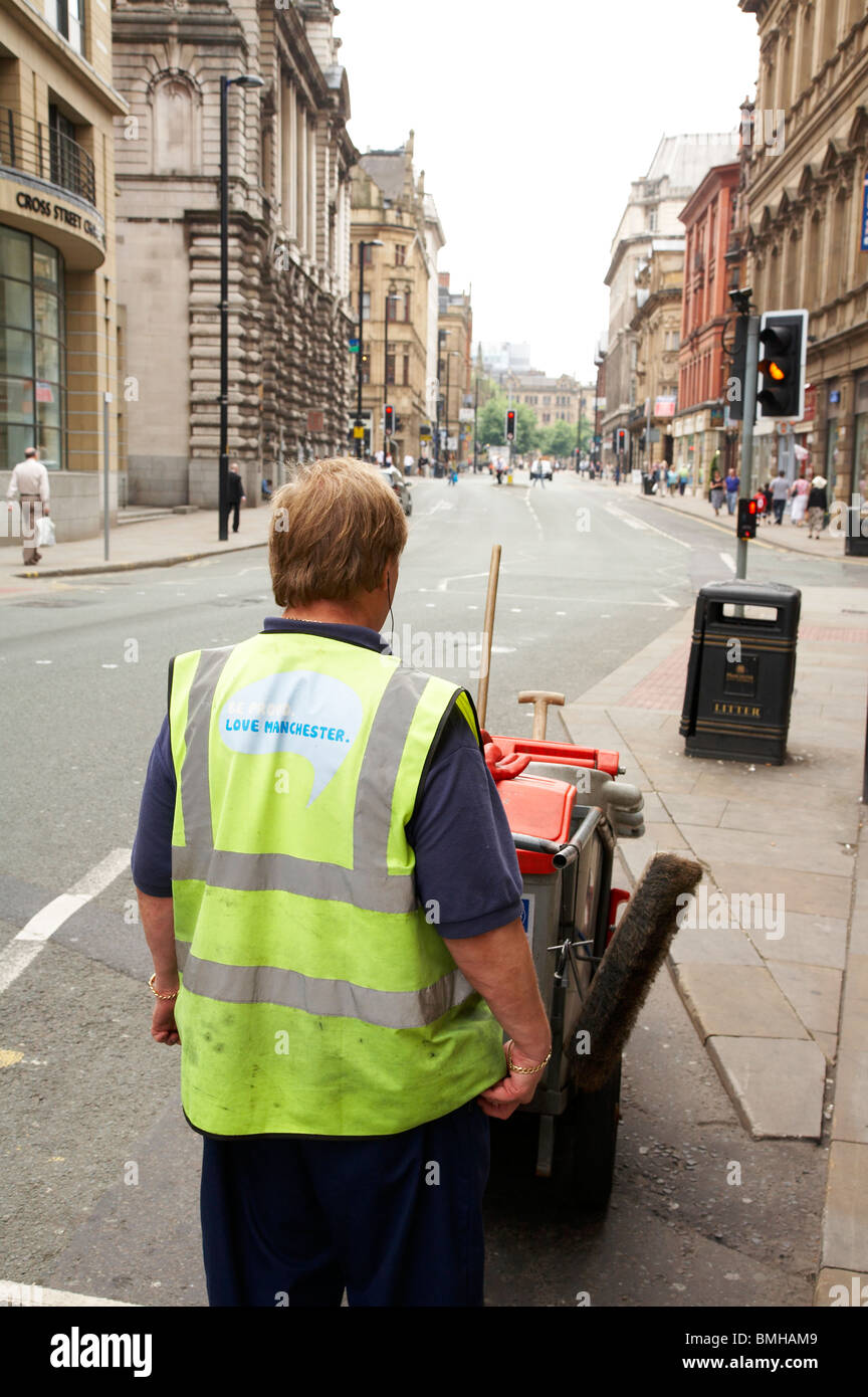 Street cleaner with slogan "Be proud love Manchester" printed on the ...