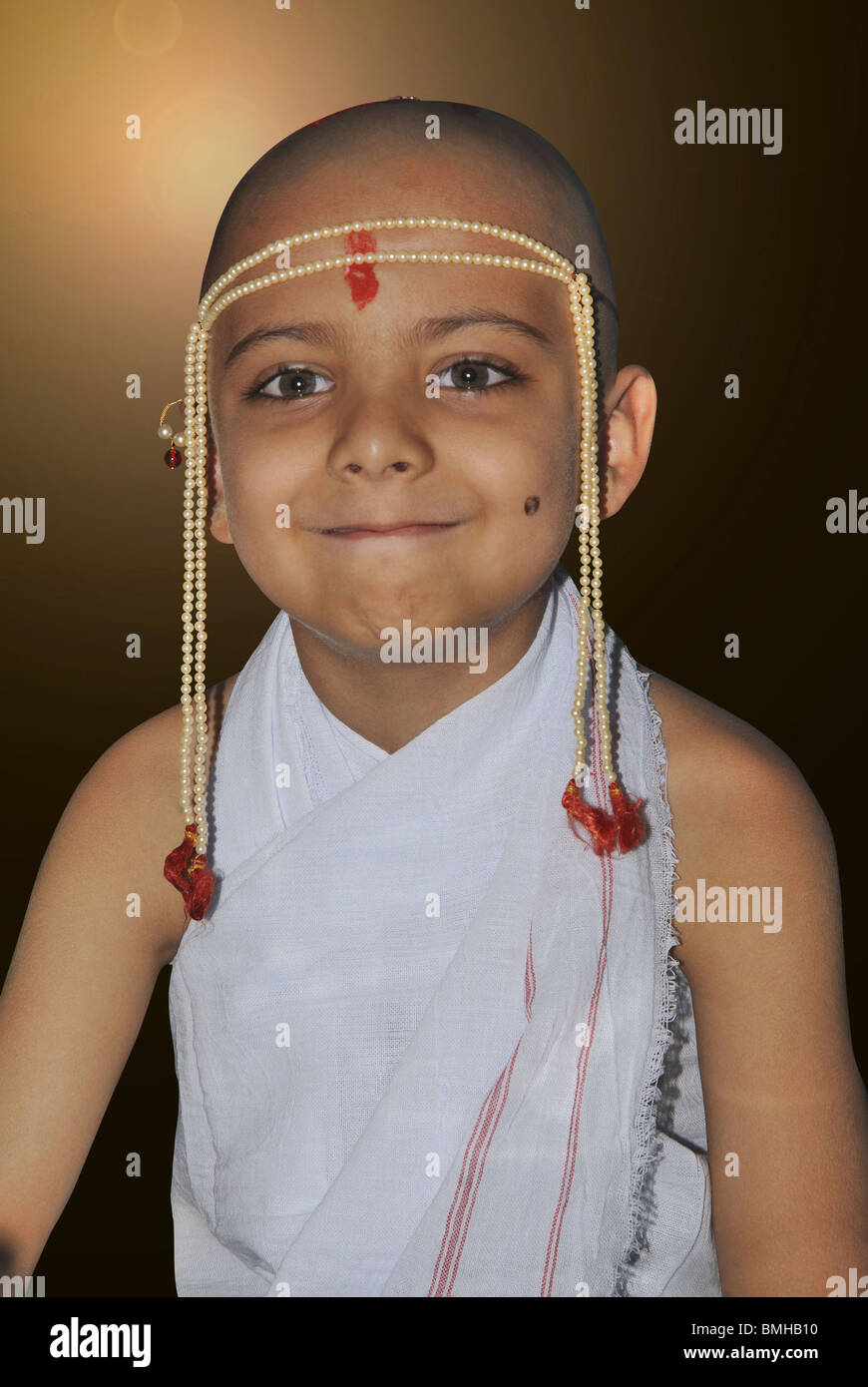 Munjan Ceremony- The child after the Munjan ceremony seated for ...