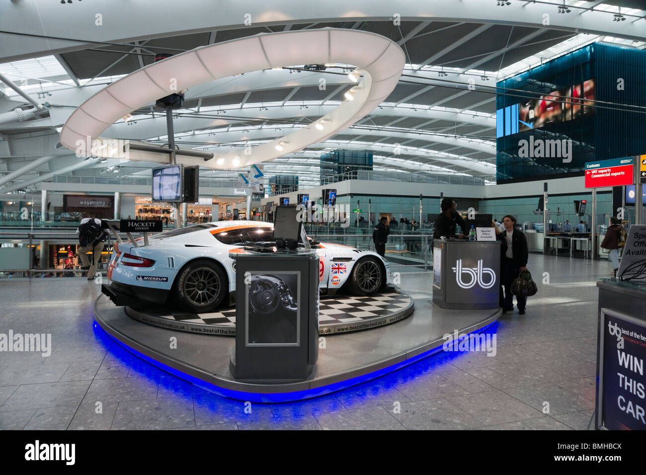 London Heathrow Airport Terminal 5 - luxury car on display for tickets ...