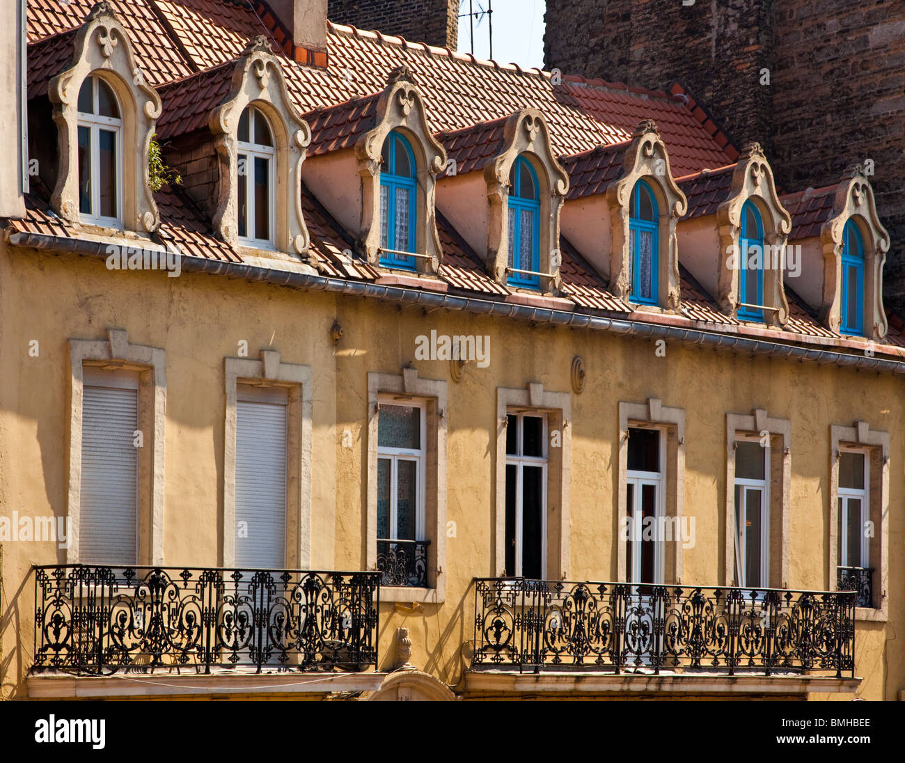 Elegant facade of houses along the Grande Rue in the French coastal ...