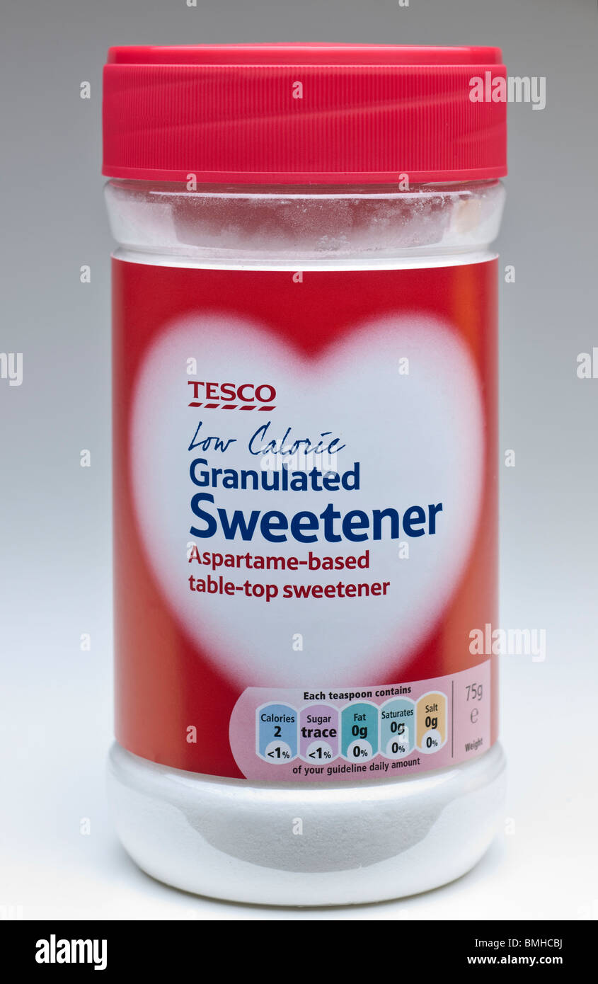 Plastic jar of Tesco Low calorie Aspartame based granulated sweetener ...