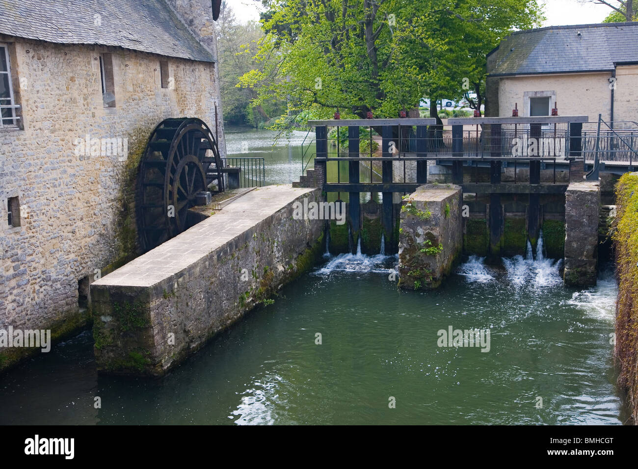 Waterwheel and sluice gates on the river Aure at Bayeux, in Normandy ...