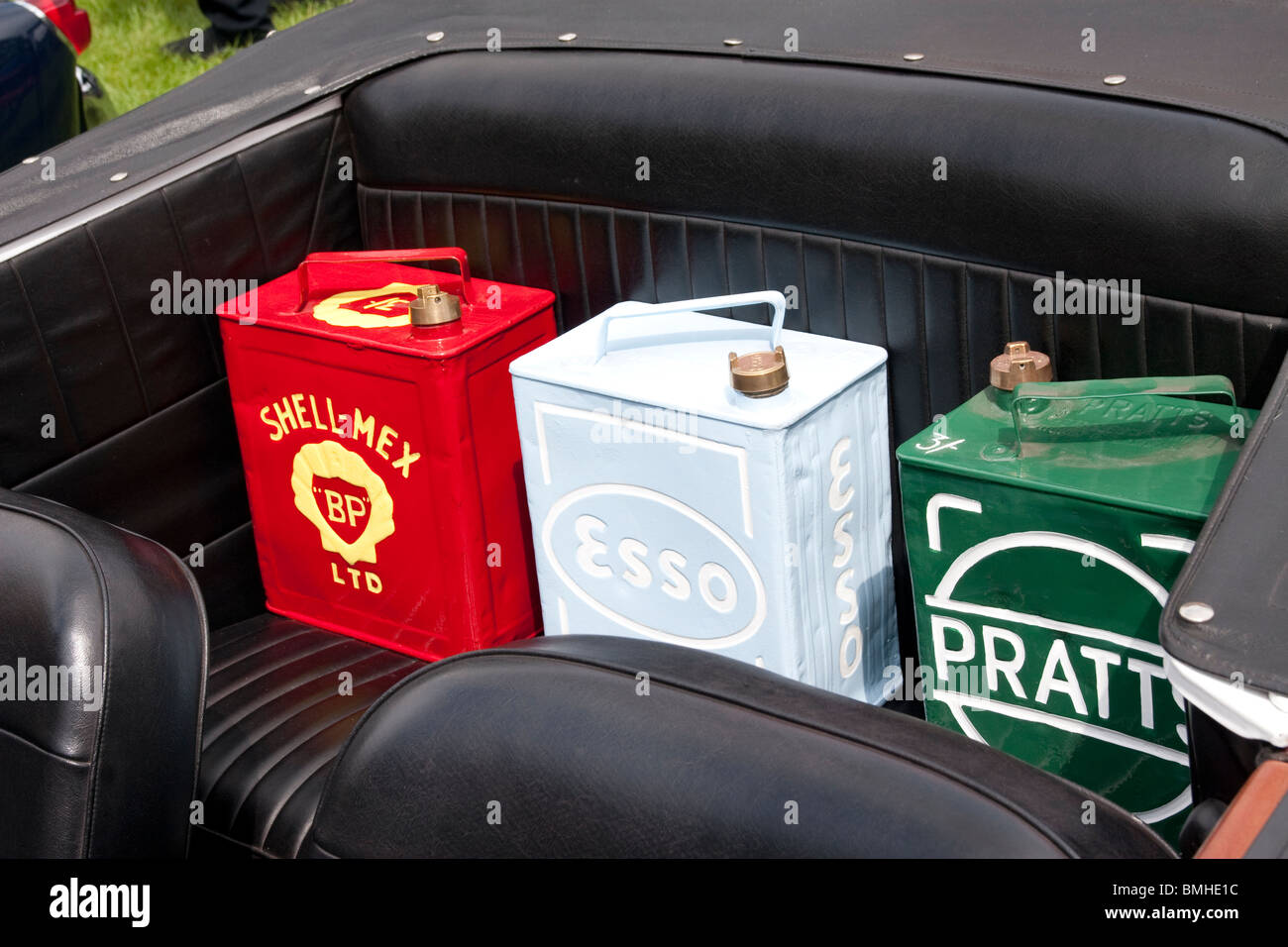 Old metal fuel cans on the back seat of a classic car Stock Photo - Alamy
