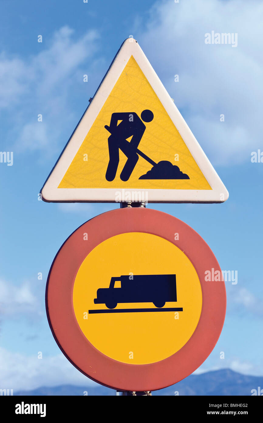 Traffic Signs; Men At Work And No Entry For Trucks Traffic Signs Stock ...