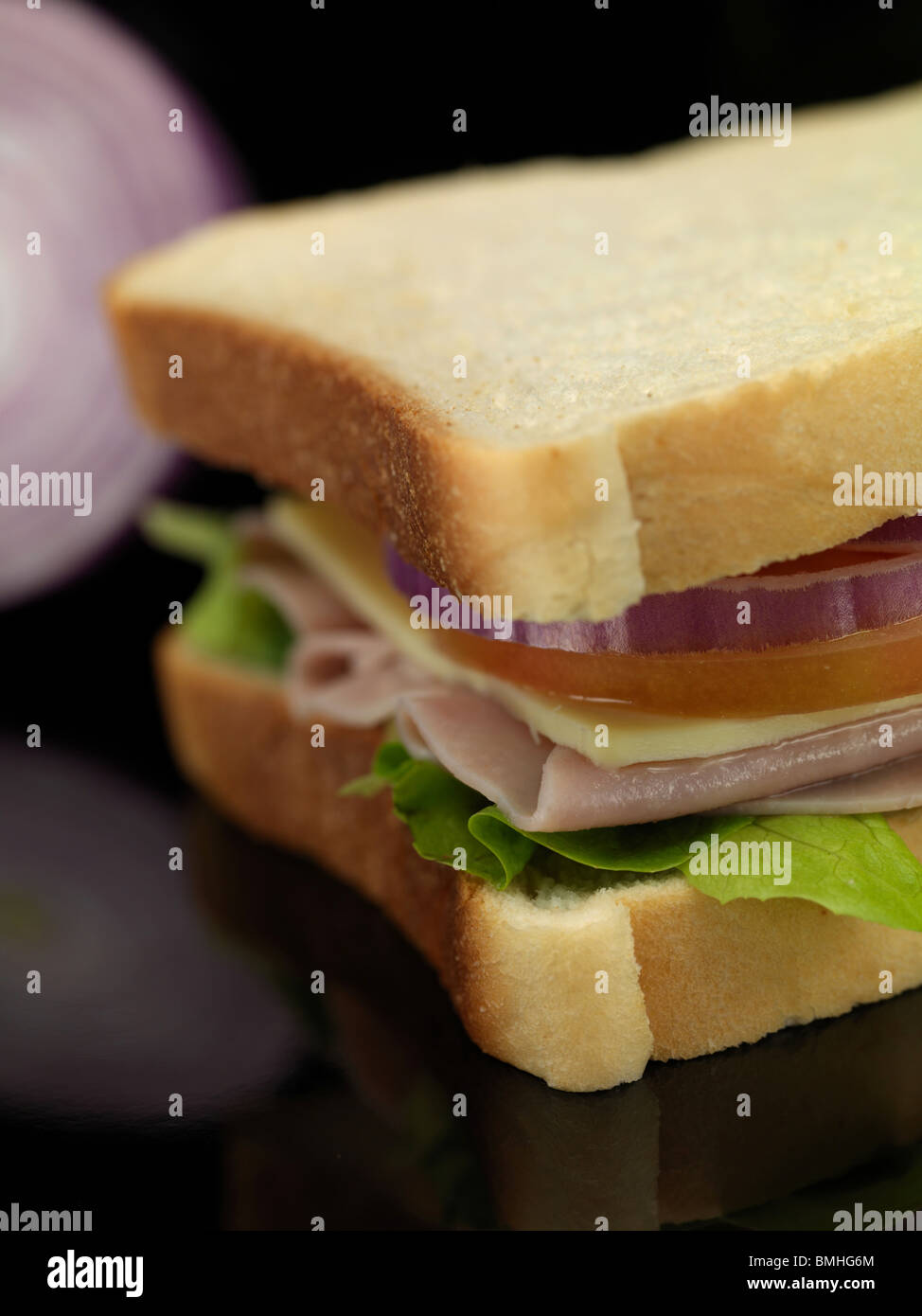 A sandwich made with white bread Stock Photo - Alamy