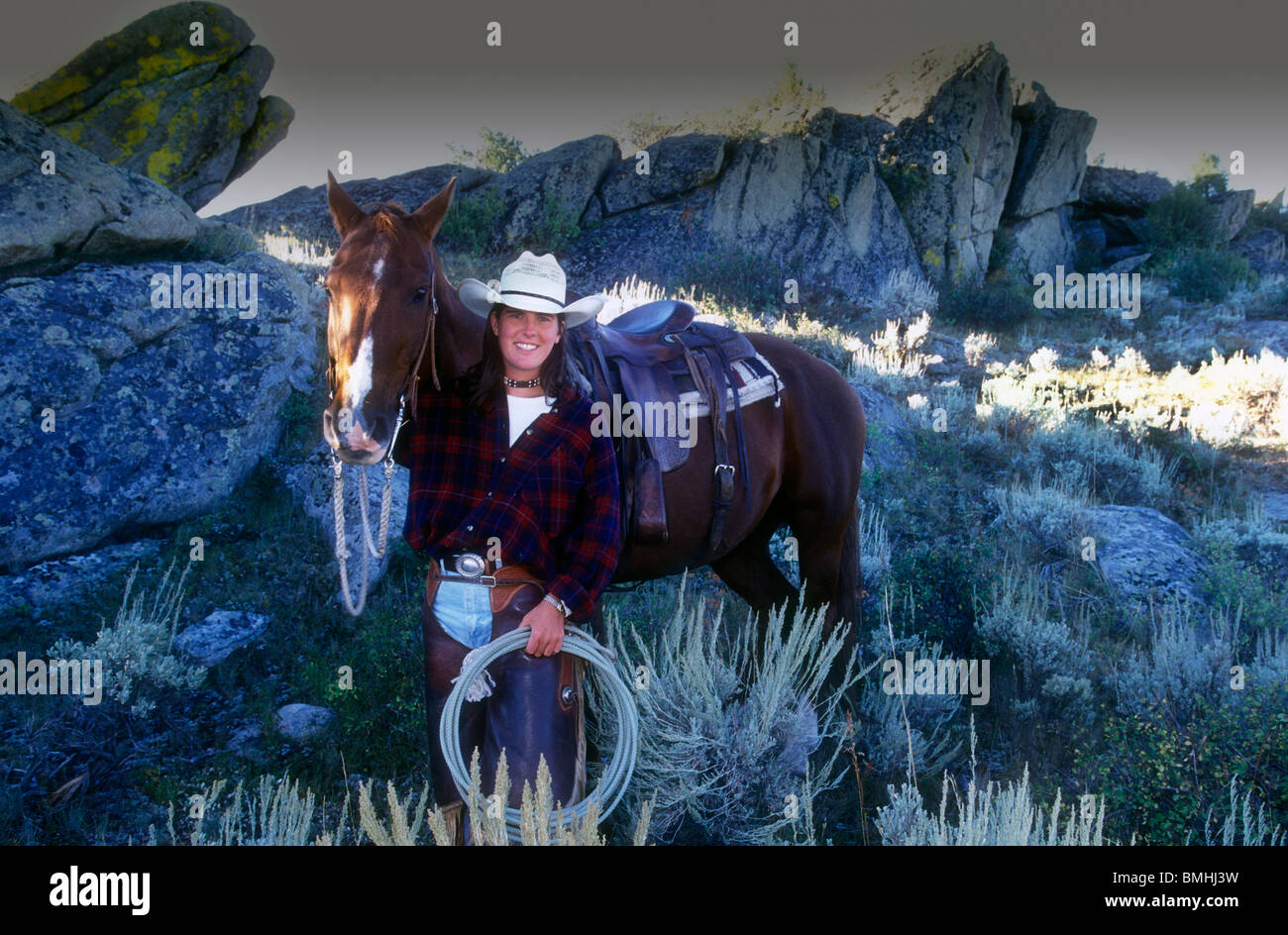 Woman wrangler on dude ranch in Wyoming USA Stock Photo - Alamy