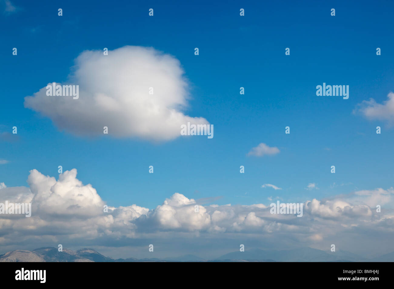 Fluffy White Clouds In Blue Sky Stock Photo - Alamy