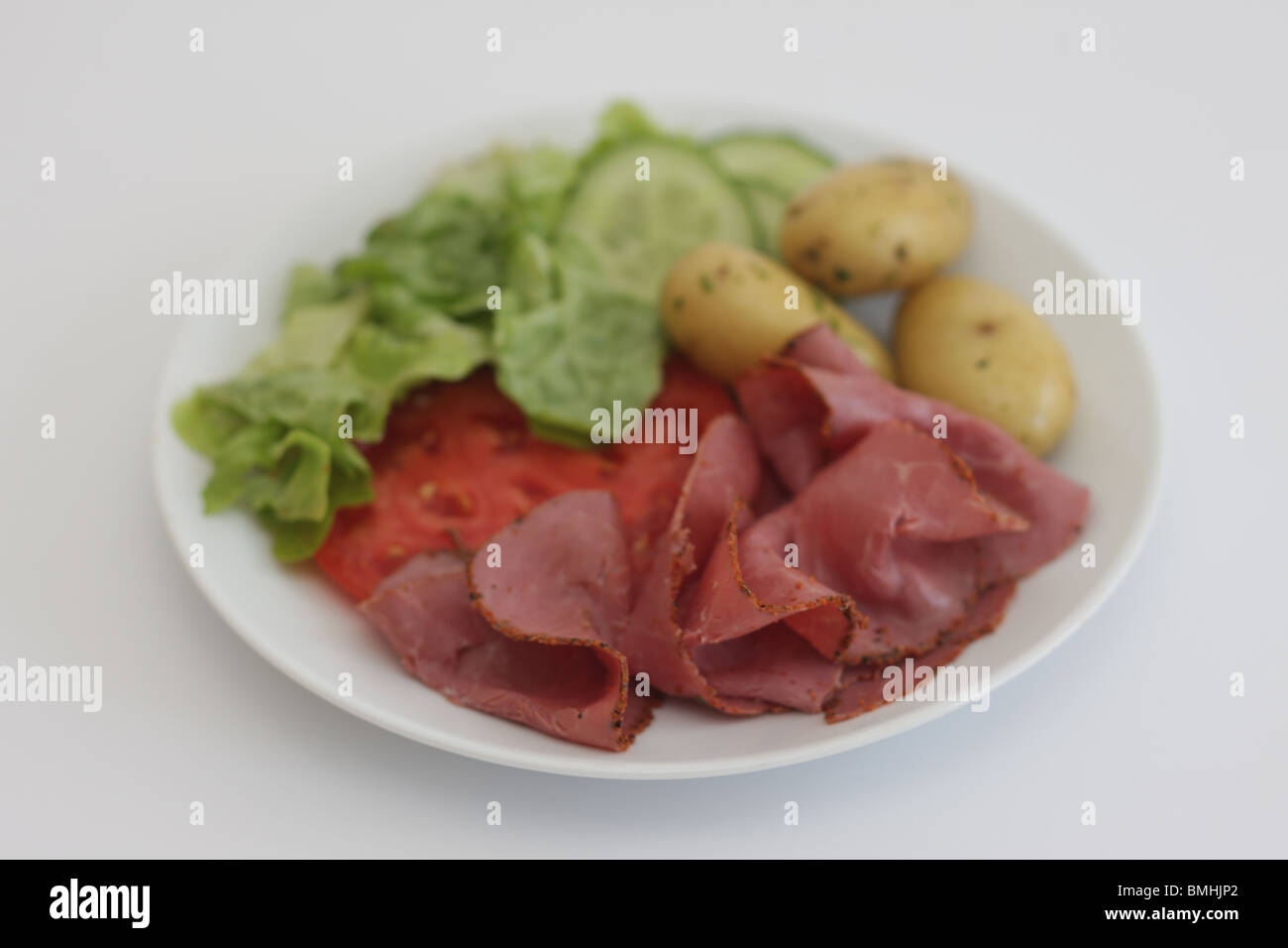 Pastrami Salad with New Boiled Potatoes Stock Photo - Alamy