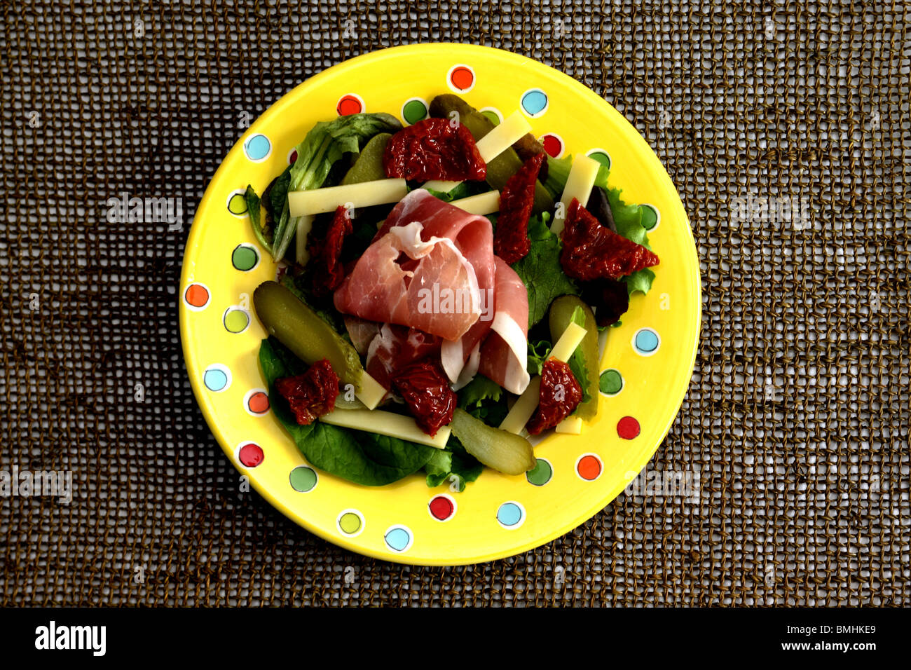 Spanish Style Cured Parma Ham With Salad Isolated Against A White ...