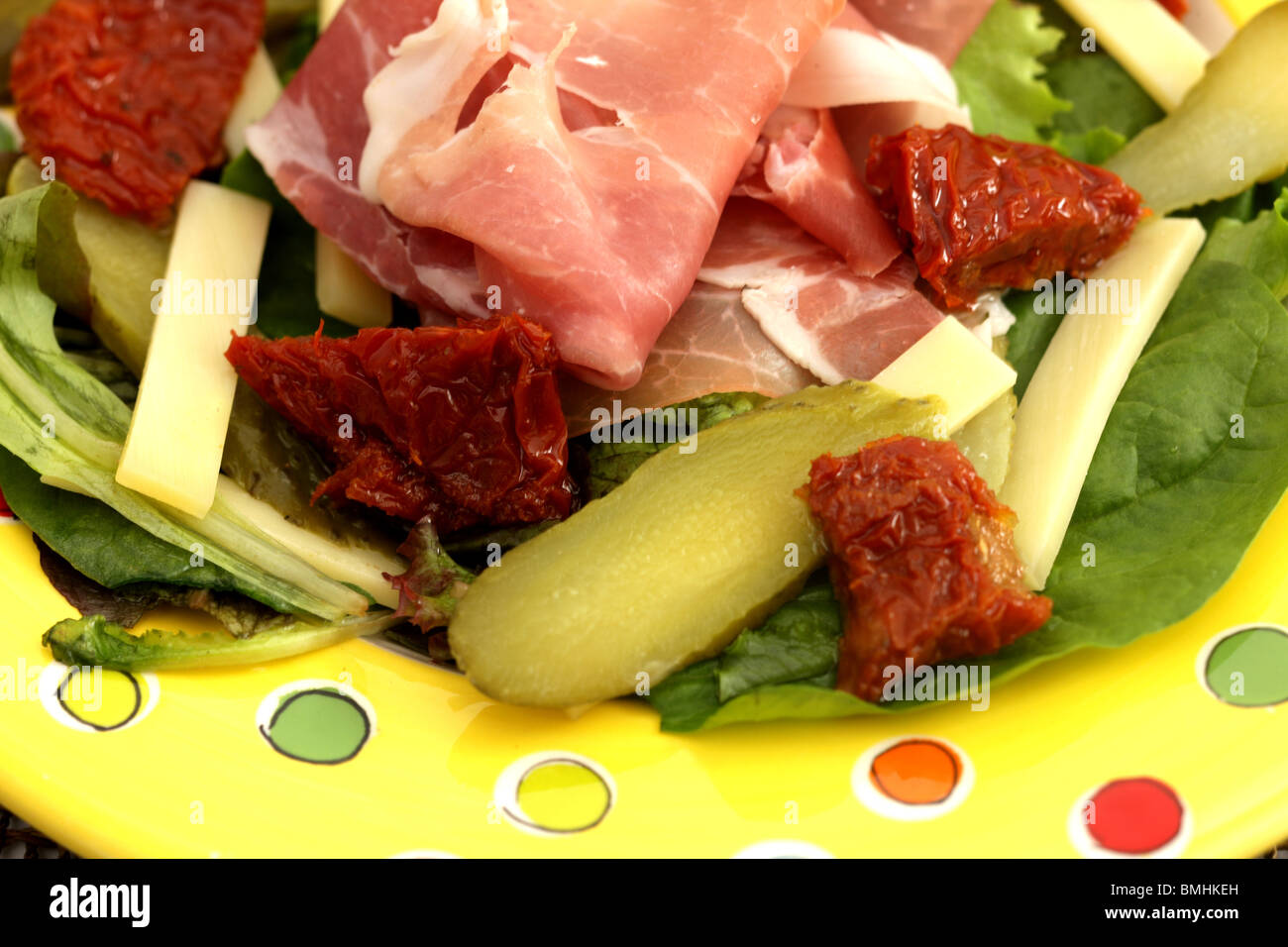 Spanish Style Cured Parma Ham With Salad Isolated Against A White ...