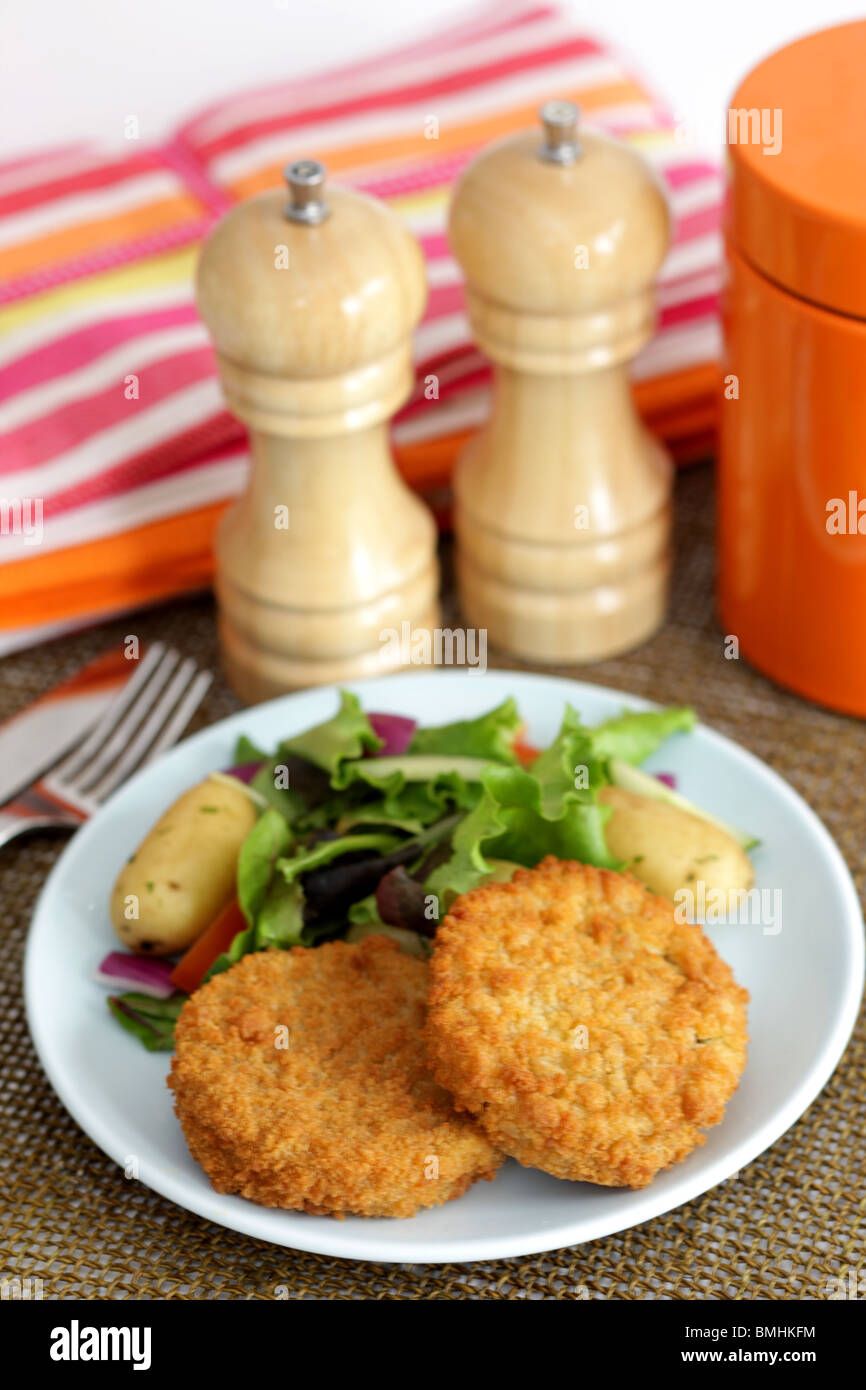 Freshly Prepared Cooked Breaded Haddock Fishcakes With A Healthy Fresh ...