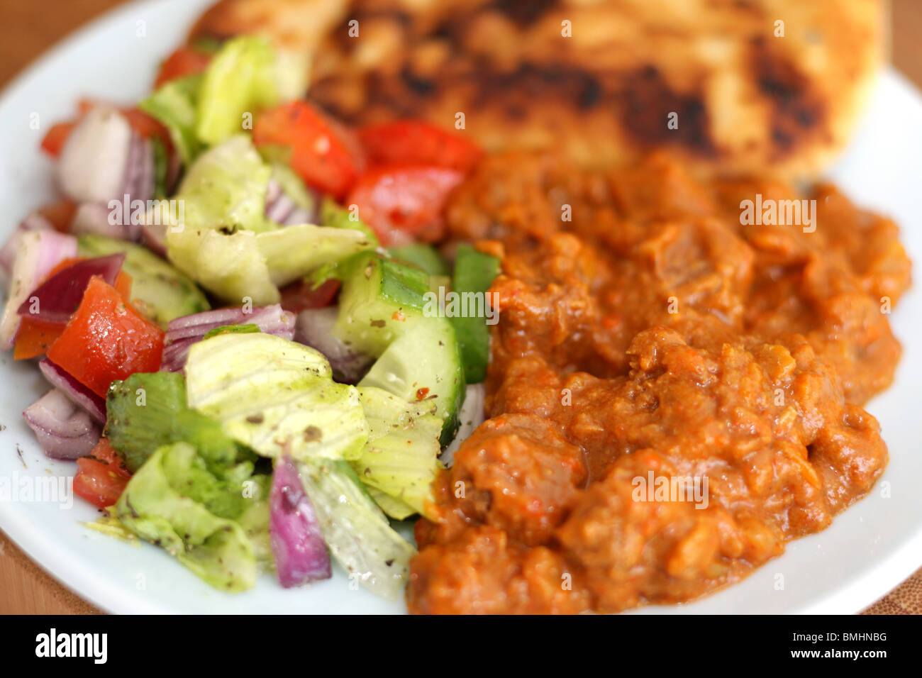 Beef Curry with Naan Bread Stock Photo - Alamy