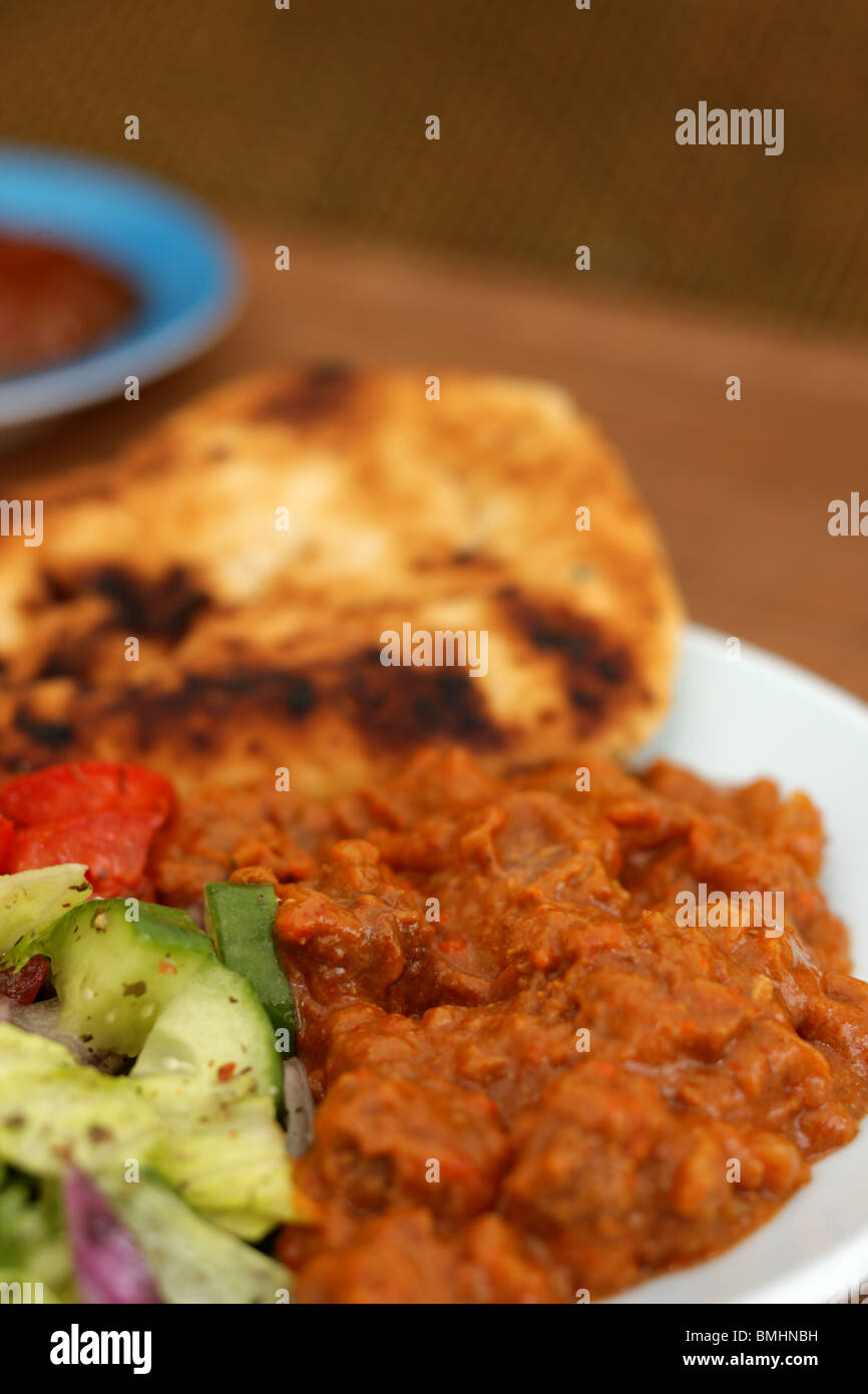 Beef Curry with Naan Bread Stock Photo - Alamy