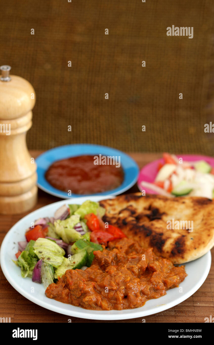 Beef Curry with Naan Bread Stock Photo - Alamy