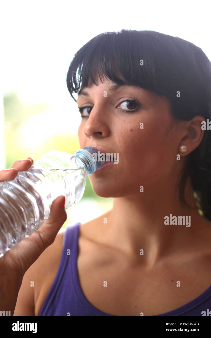 Young Woman Drinking Water. Model Released Stock Photo - Alamy