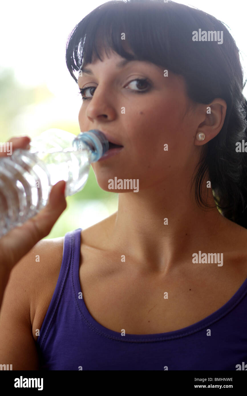 Young Woman Drinking Water. Model Released Stock Photo - Alamy