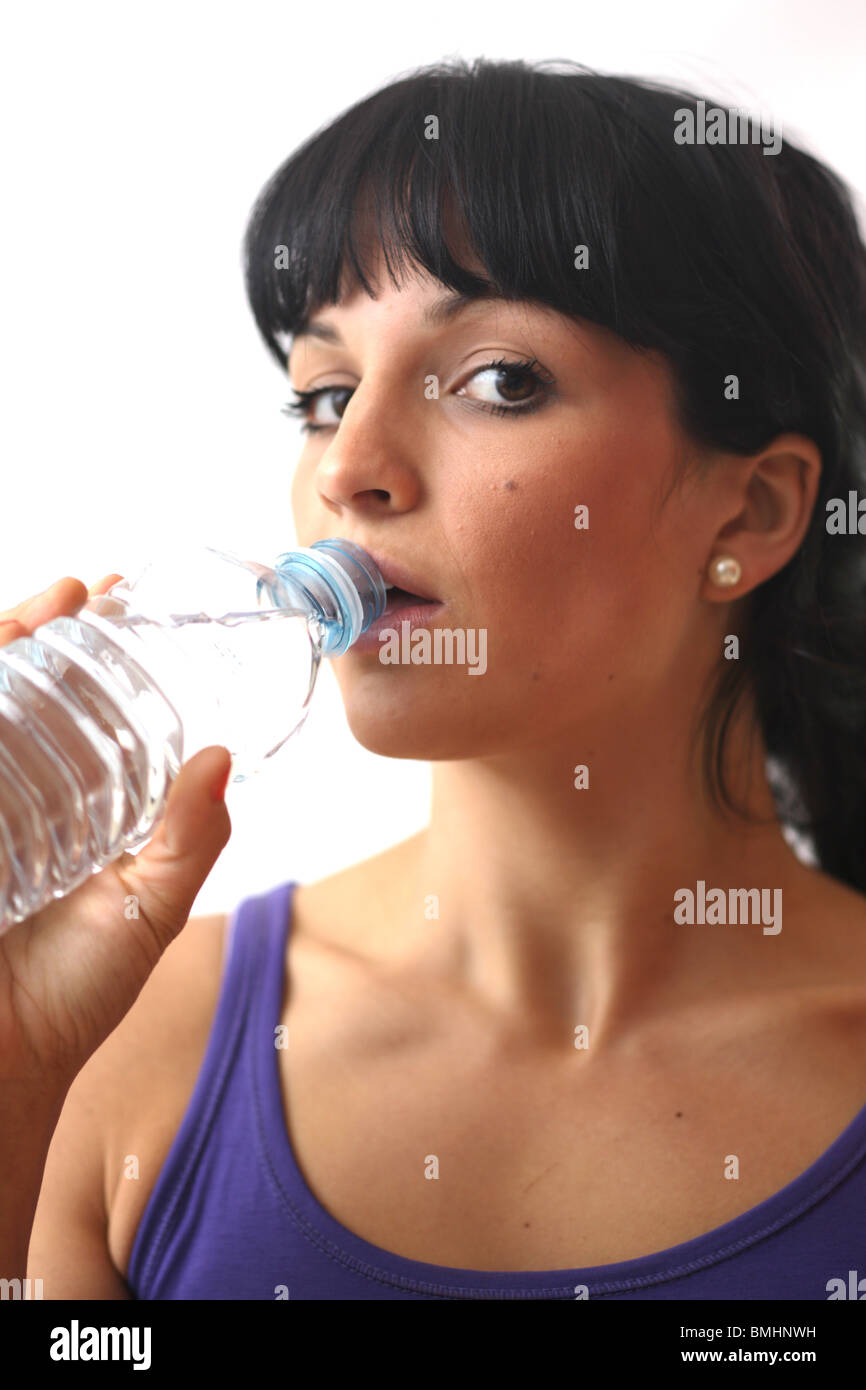 Young Woman Drinking Water. Model Released Stock Photo - Alamy