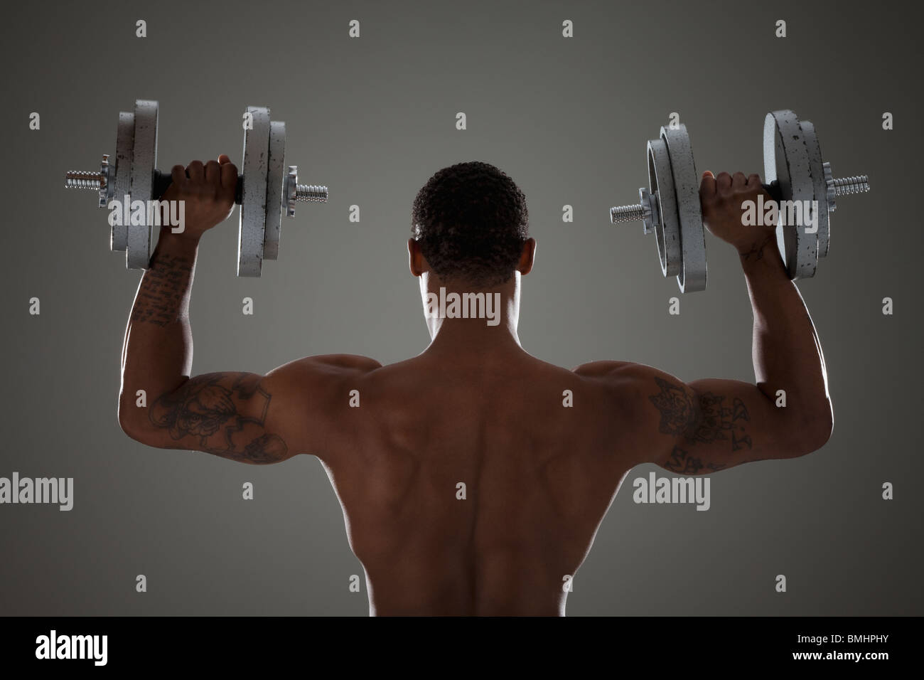 Back physically strong muscular man hi-res stock photography and images ...