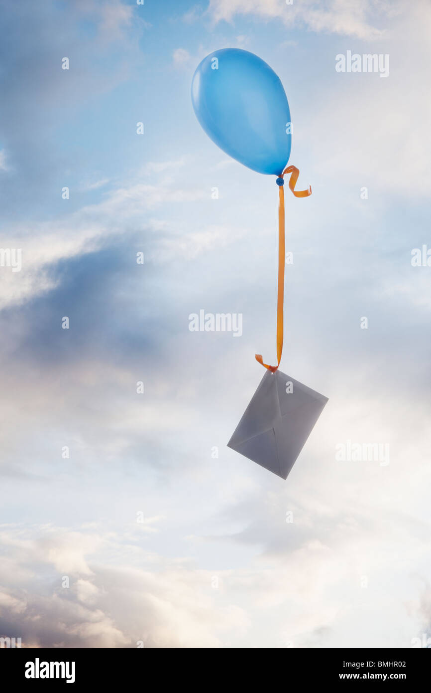 Balloon tied to an envelope Stock Photo - Alamy