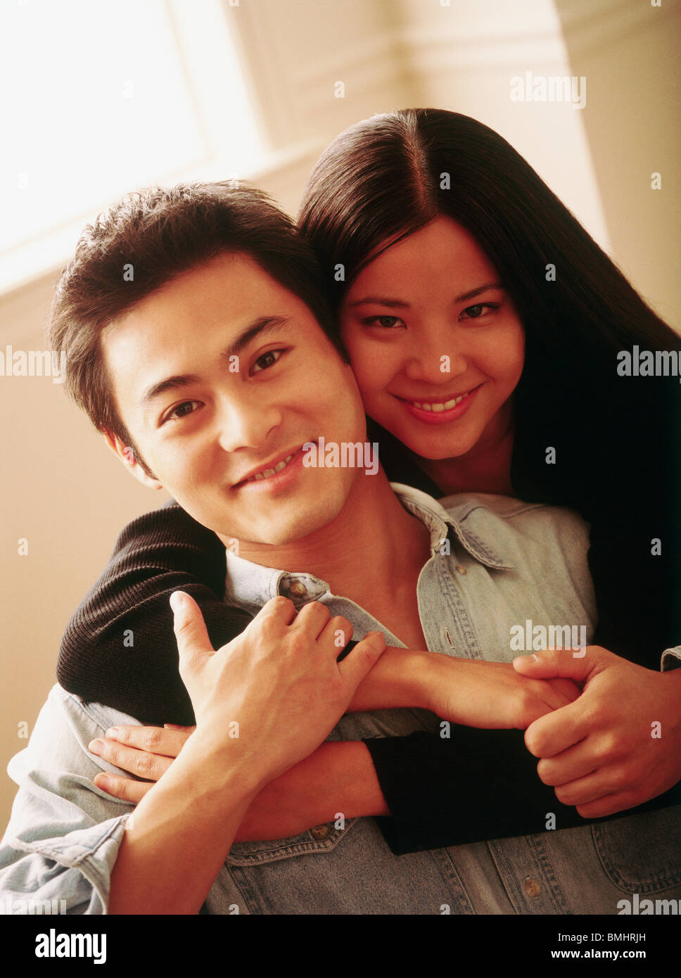 Amorous woman man embracing looking hi-res stock photography and images ...