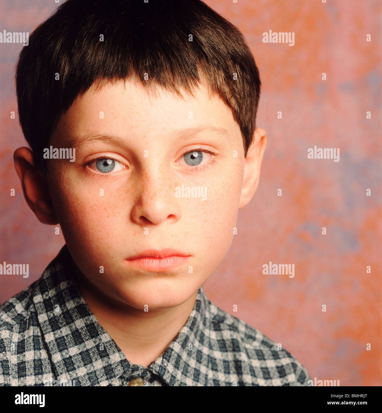 Portrait of a sad young boy Stock Photo - Alamy