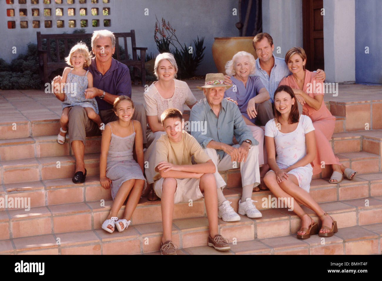 Family portrait on the steps Stock Photo - Alamy