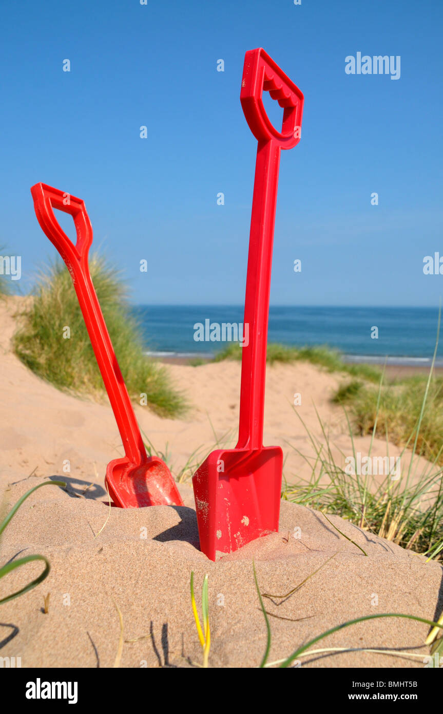 Plastic spades standing sand hi-res stock photography and images - Alamy