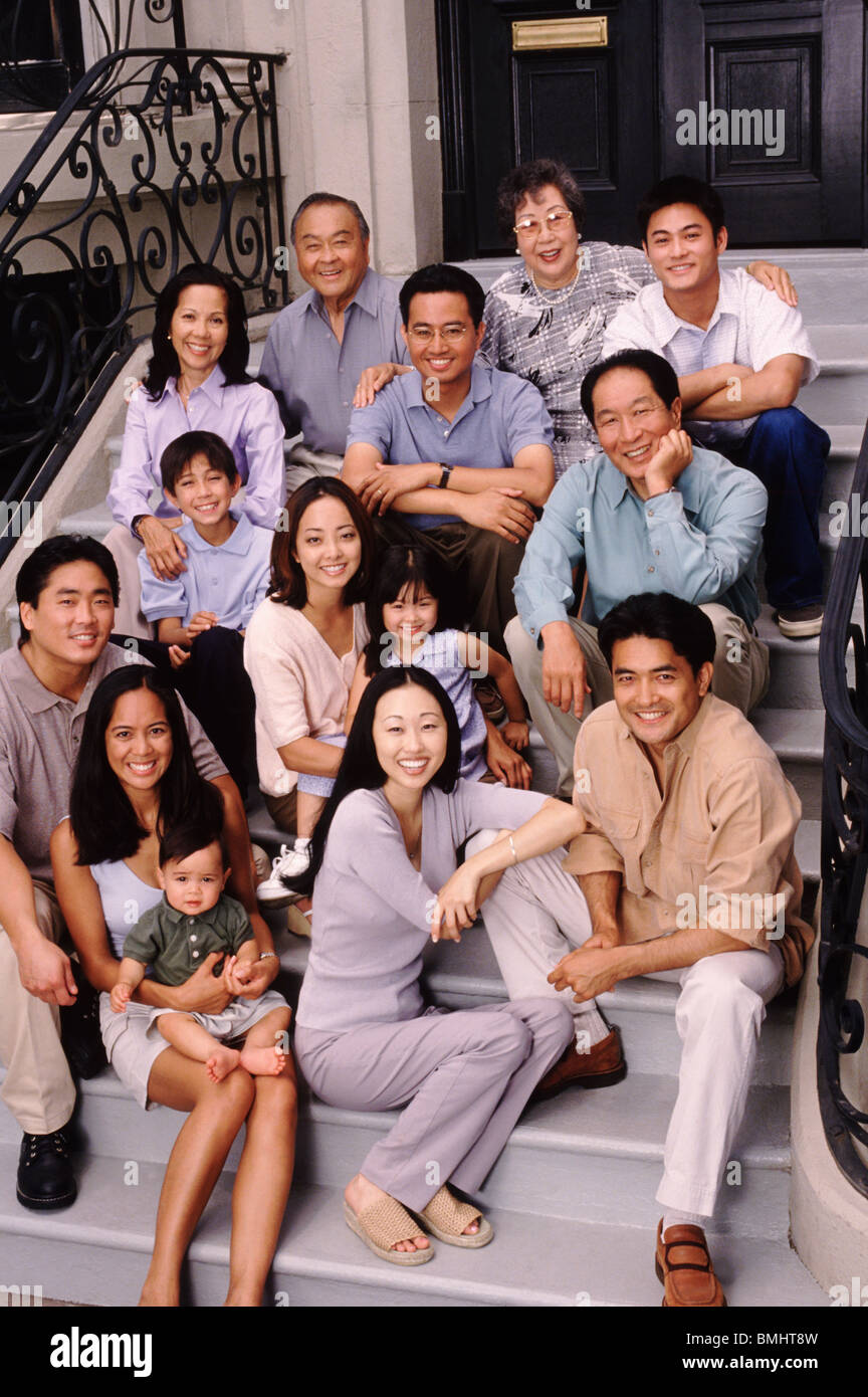 Portrait of generations on the front steps of the house Stock Photo - Alamy