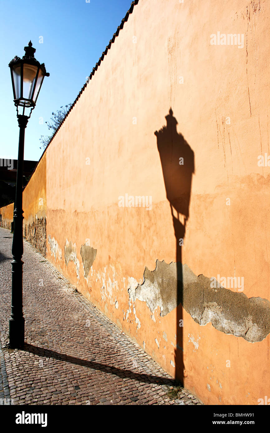 Vintage gas-lamp reflecting on the wall Stock Photo - Alamy