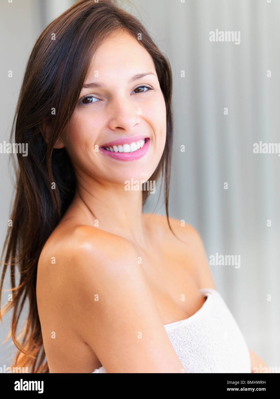 Woman wearing a towel Stock Photo - Alamy
