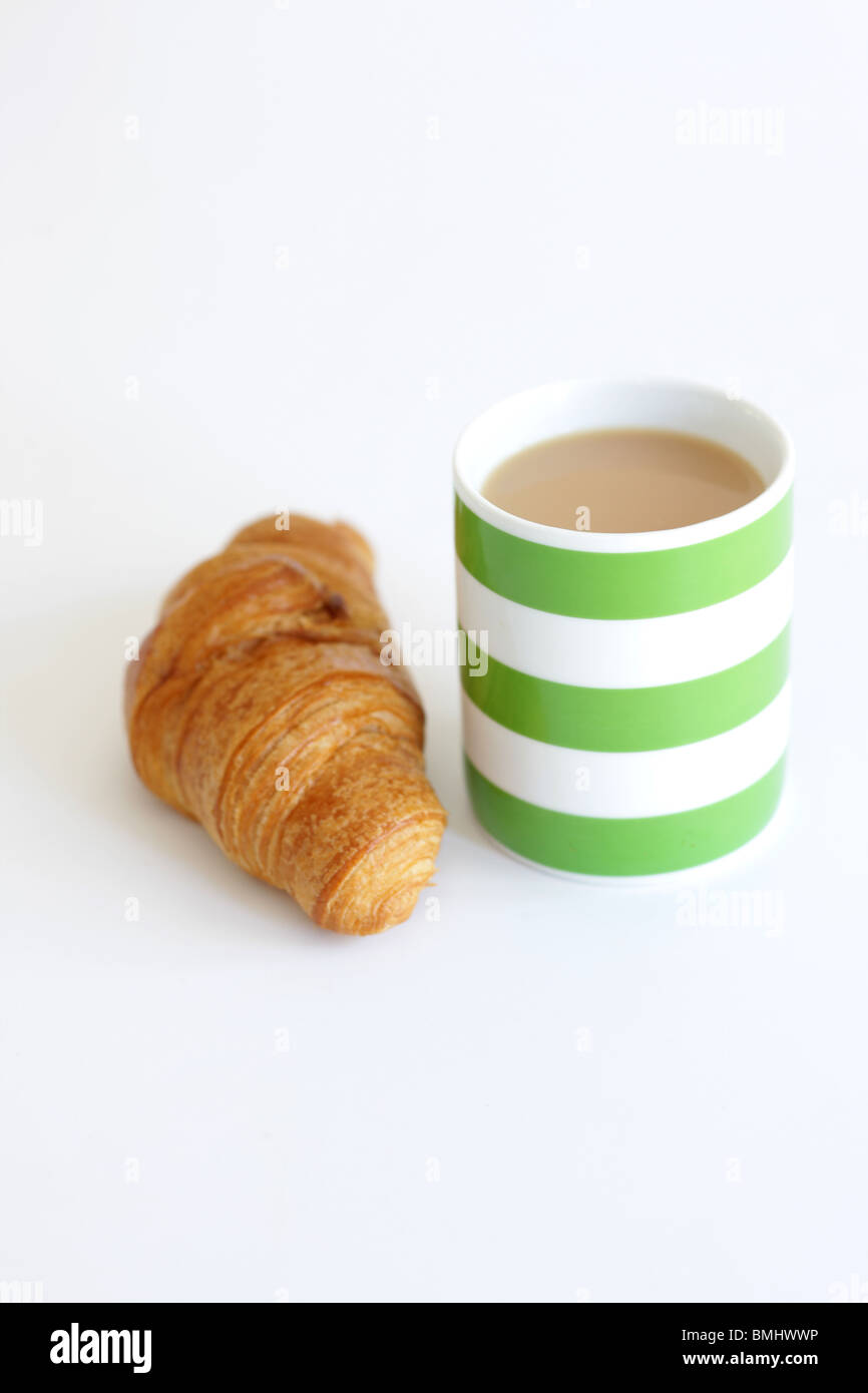 Croissant with a Mug of Tea Stock Photo - Alamy