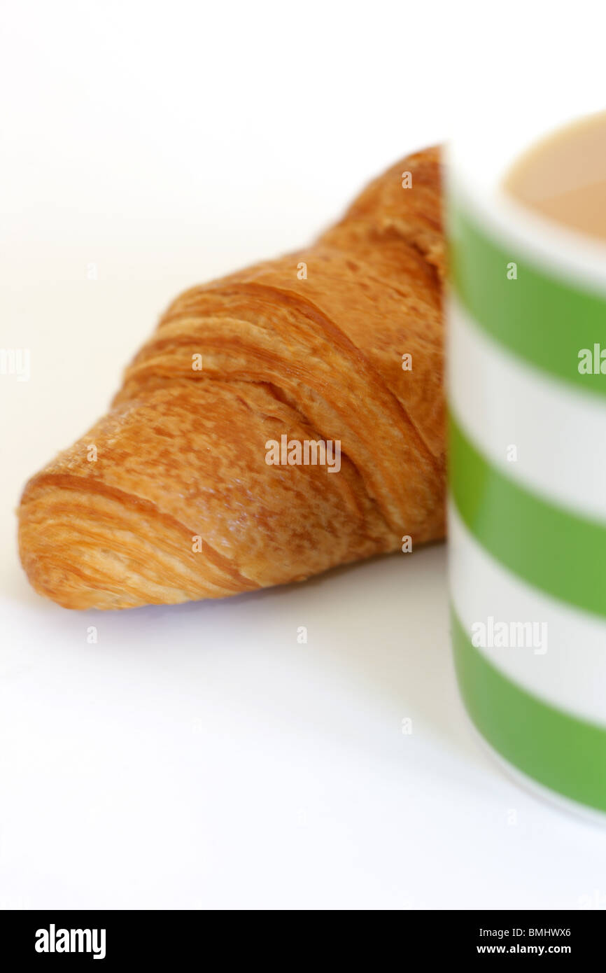 Croissant with a Mug of Tea Stock Photo - Alamy