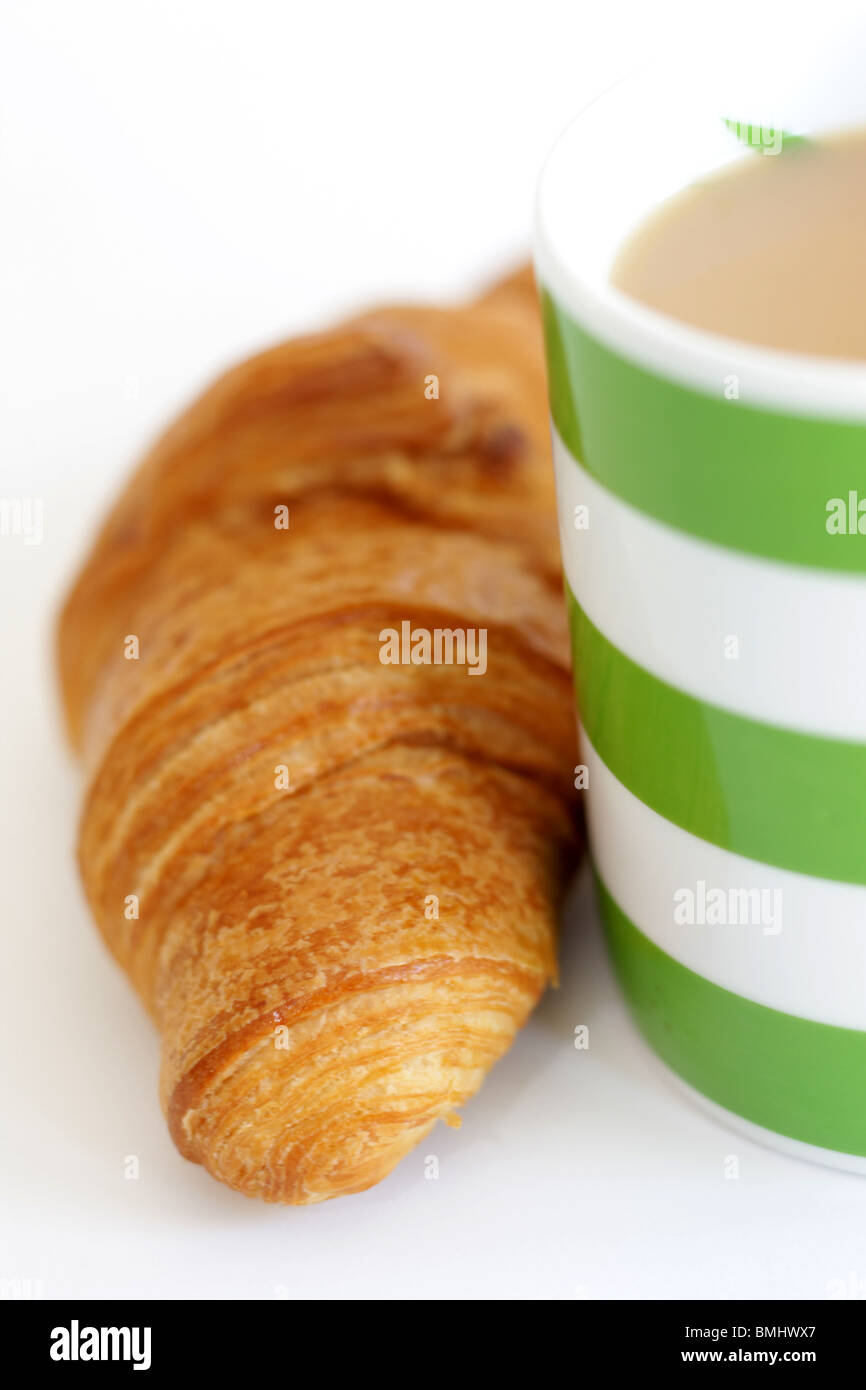 Croissant with a Mug of Tea Stock Photo - Alamy