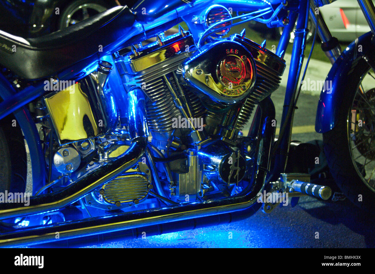 Harley Davidson engine lit up in blue lights Stock Photo - Alamy
