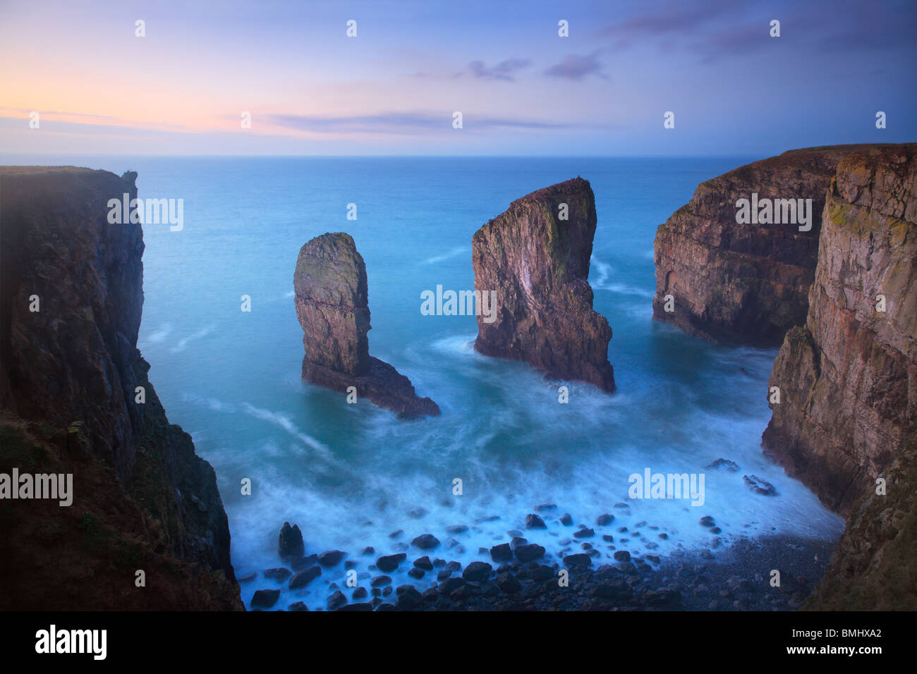 The Elegug Stacks just before dawn on a winter's morning along the ...