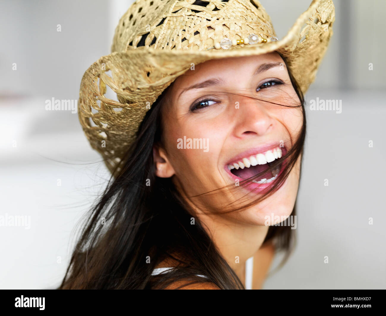 Woman wearing straw hat Stock Photo - Alamy