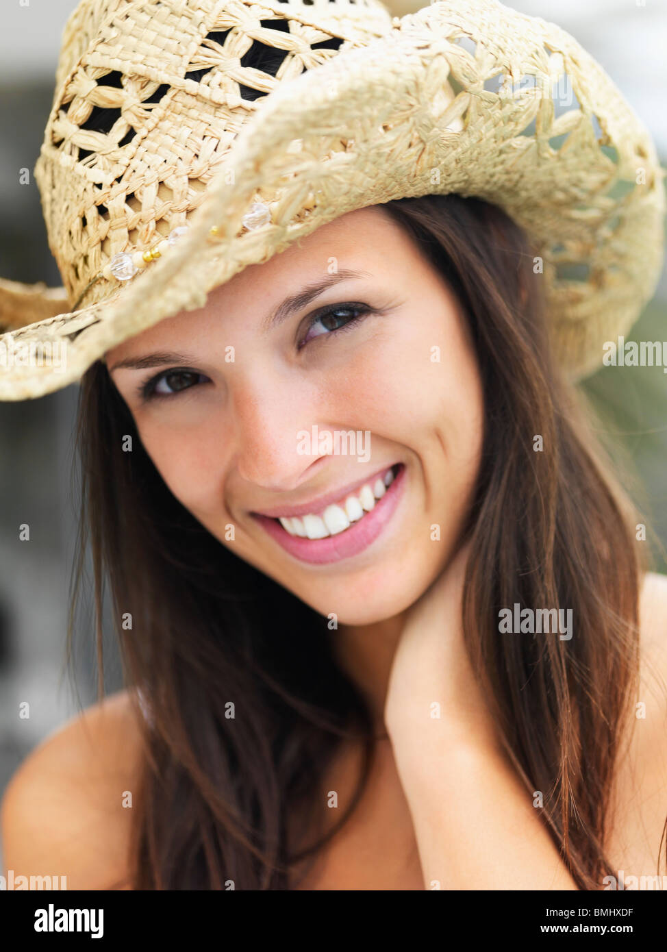 Woman wearing straw hat Stock Photo - Alamy