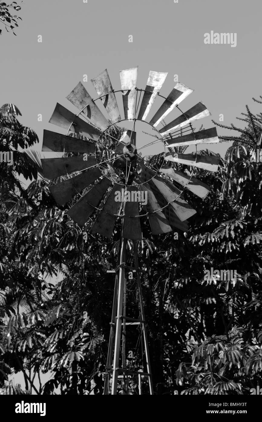 SILVER WINDMILL AGAINST BLUE SKY BACKGROUND BDB Stock Photo - Alamy