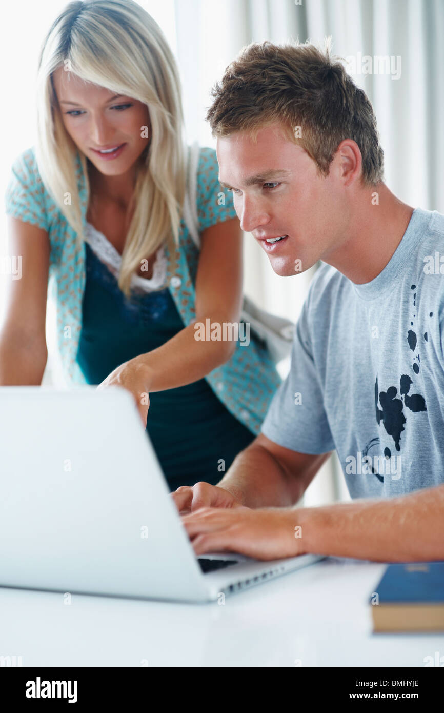Students working on laptop Stock Photo - Alamy