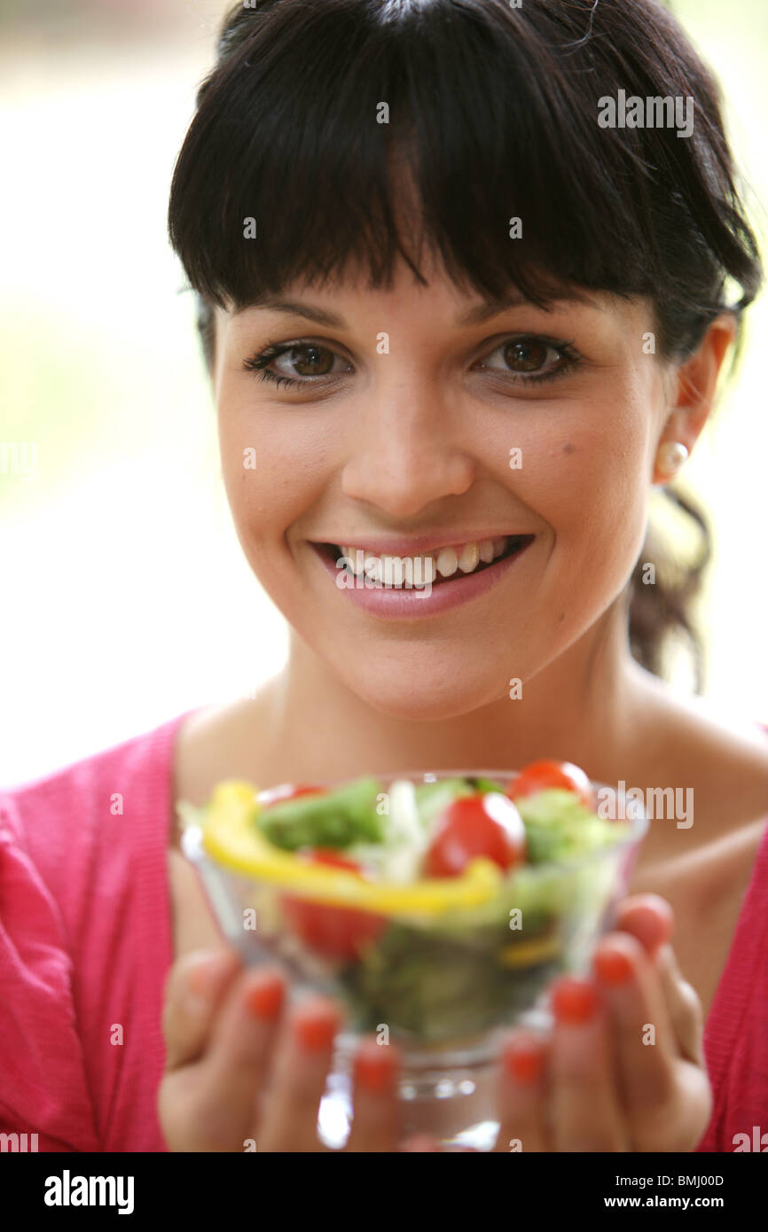 Young Woman Eating Italian Salad. Model Released Stock Photo - Alamy