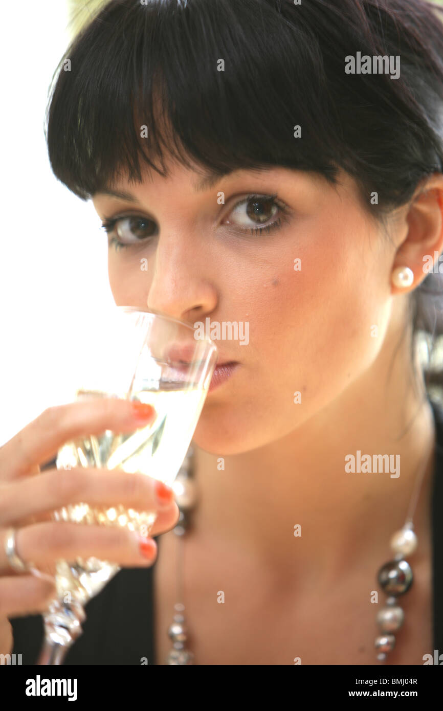 Young Woman Drinking Champagne. Model Released Stock Photo - Alamy