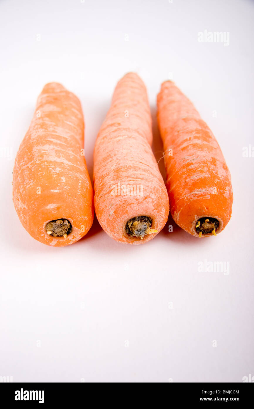 Three carrots (Daucus carota Stock Photo - Alamy