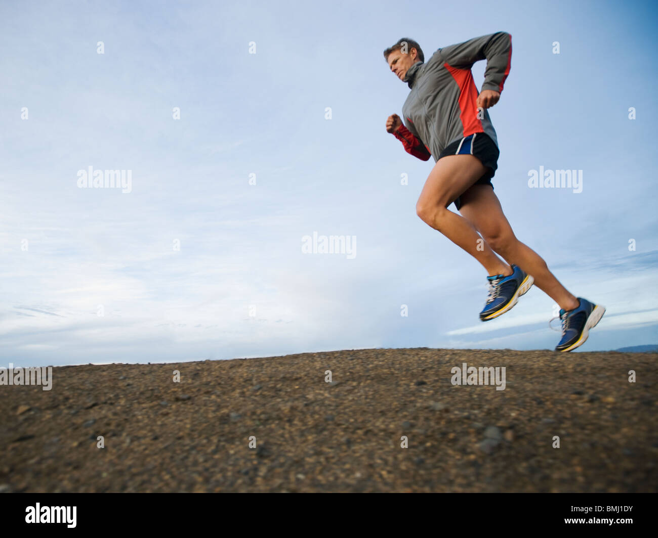 Person running on trail Stock Photo - Alamy